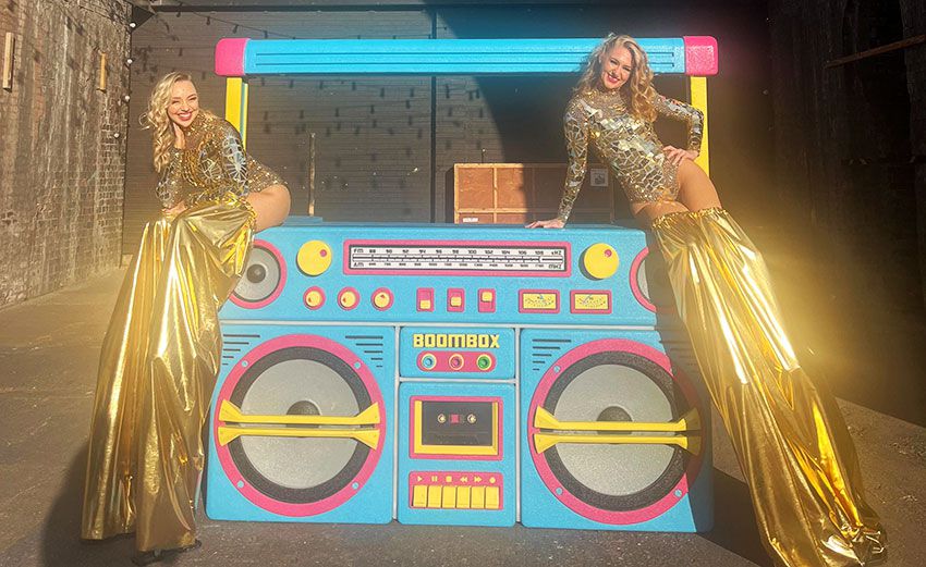 Hire 80s Gold Stilt Walkers | Scarlett Entertainment