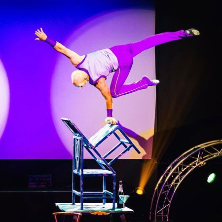 Book Chair Balancing Act Las Vegas | Scarlett Entertainment